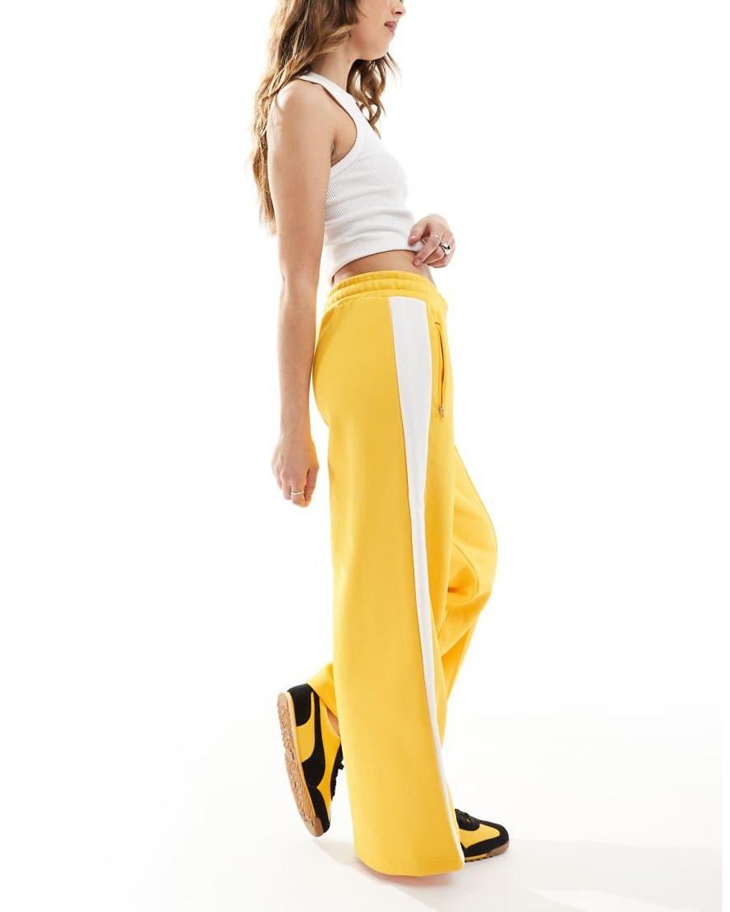 PUMA T7 Low Rise Track Trousers in Yellow | Lyst UK