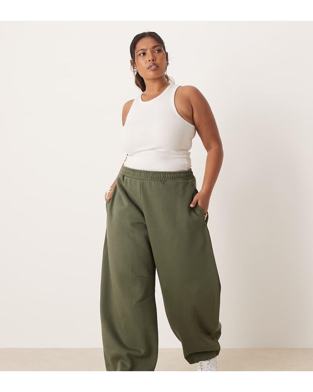 ASOS Asos Design Curve Barrel Leg Brushback Trackies in Green | Lyst UK