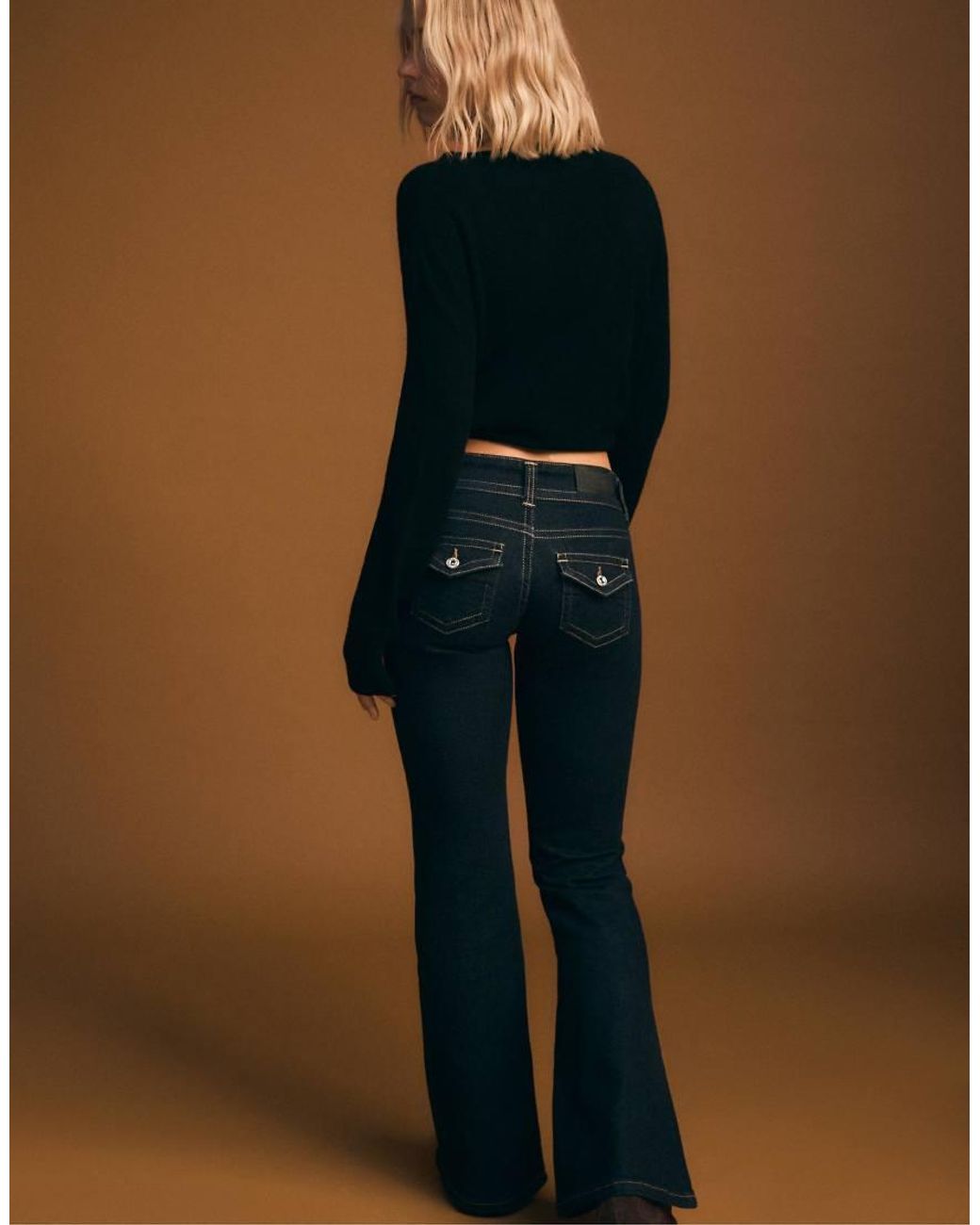 Stradivarius Low-Rise Bell Bottom Jeans With Two Metal Buttons in Blue ...