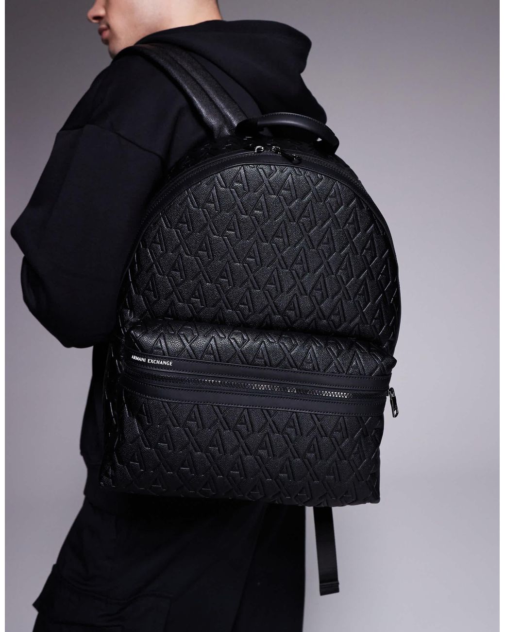 ARMANI EXCHANGE All Over Logo Faux Leather Backpack in Black for Men | Lyst