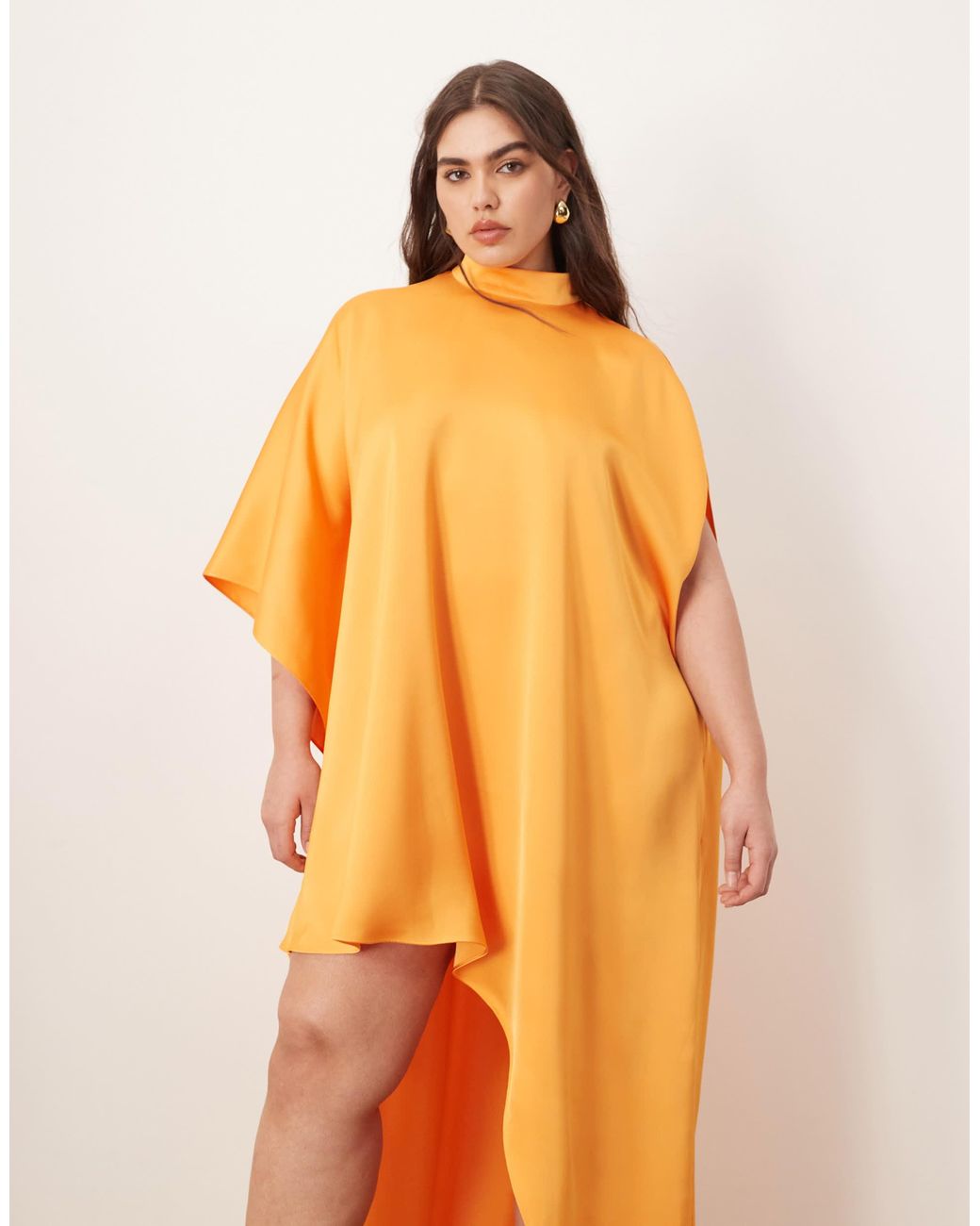 ARRANGE Curve High Neck Cape Sleeve Mini Dress With Asymmetric Hem in ...