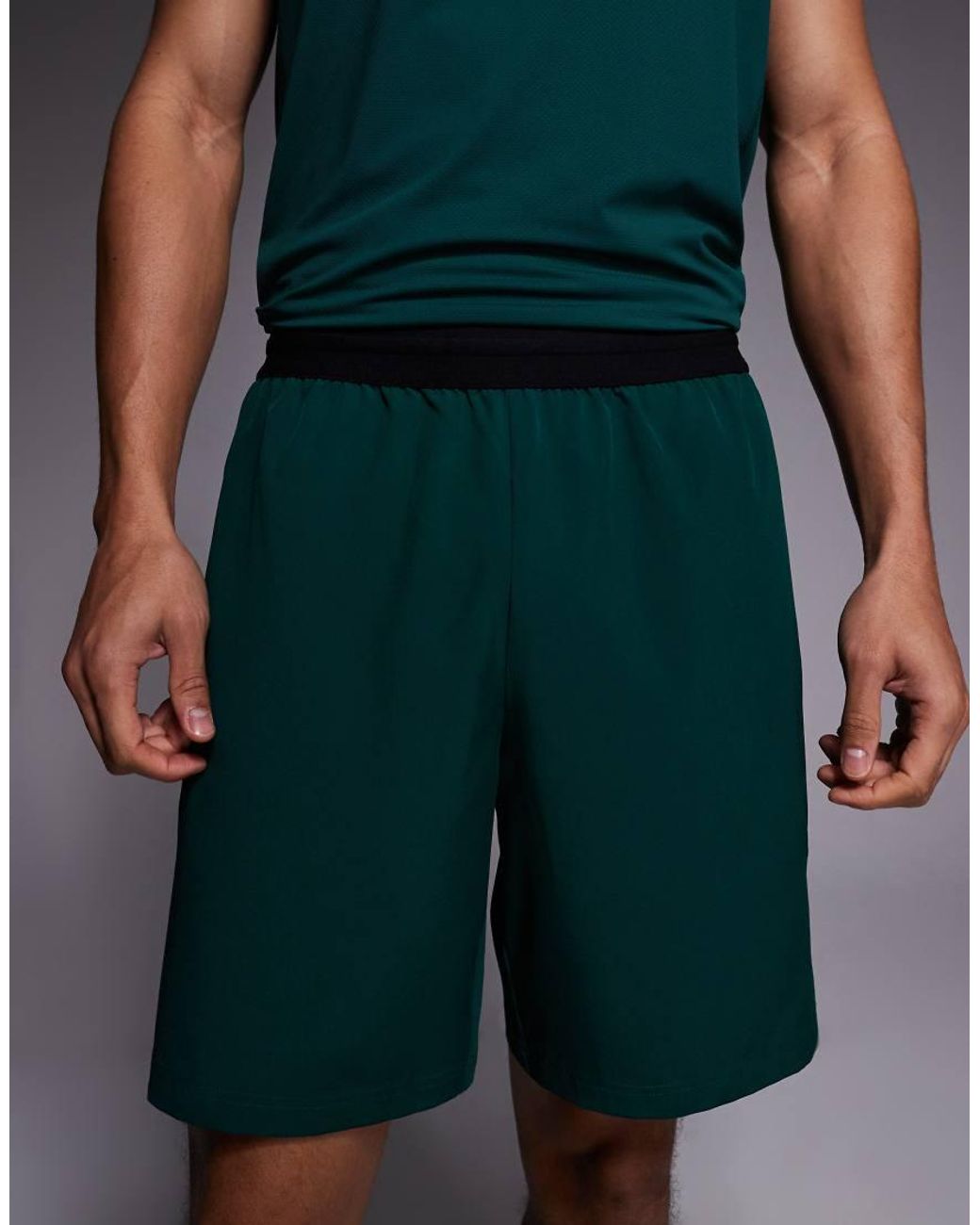 4505 7" Woven Training Shorts With Elastic Waist Band And Zip Pockets ...