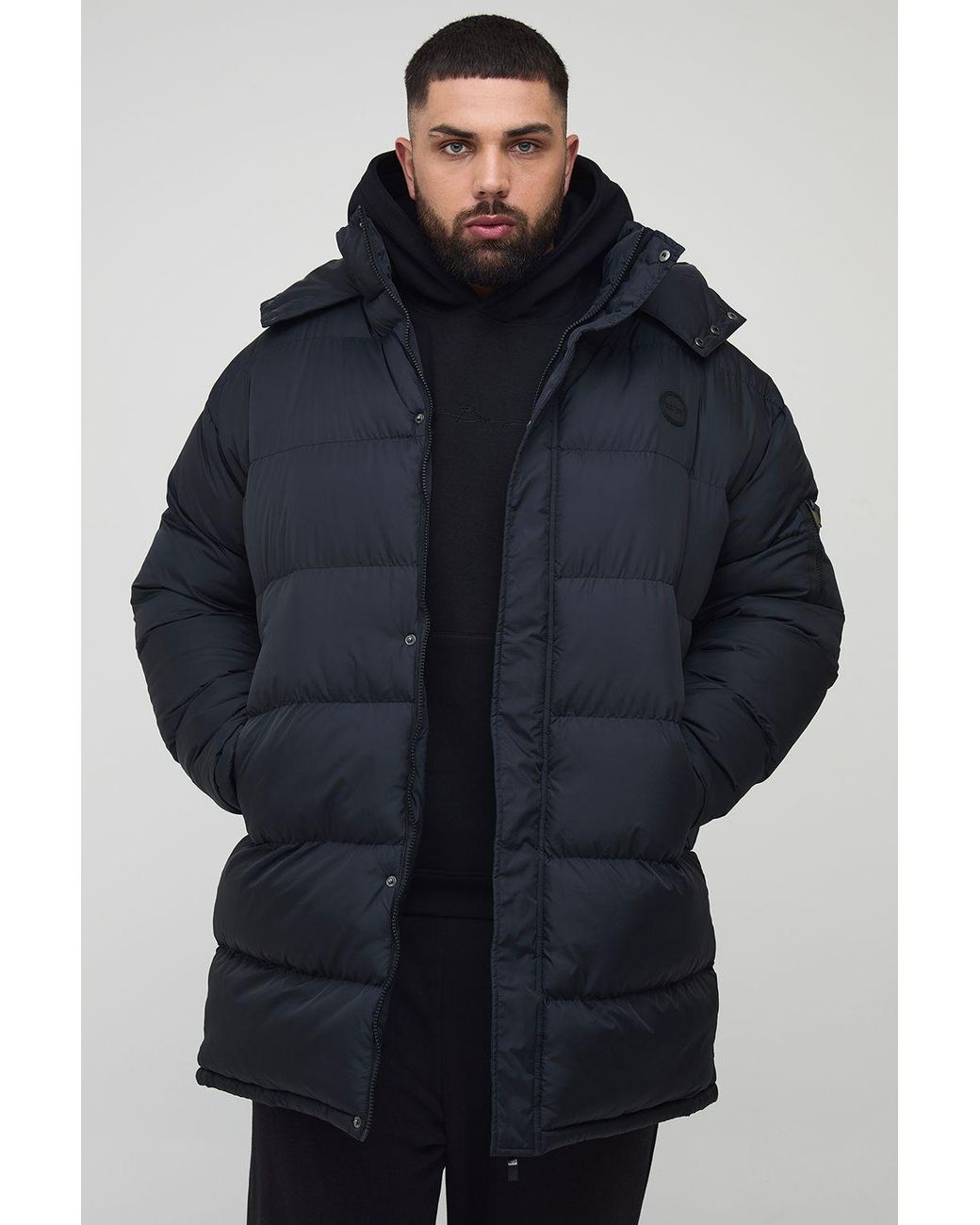 BoohooMAN Plus Regular Fit Hooded Longline Puffer Jacket in Blue for ...