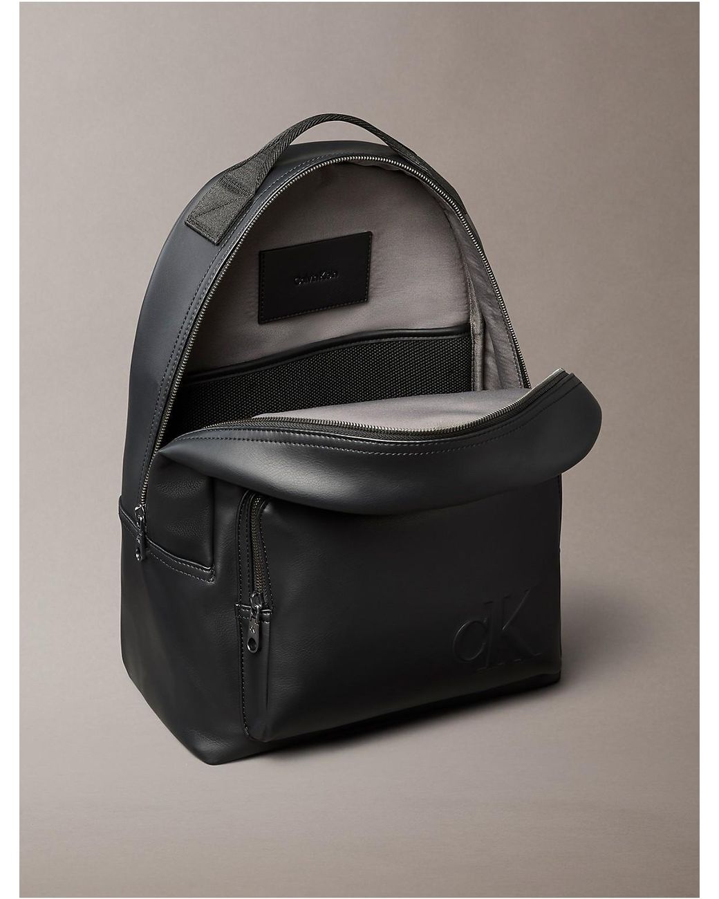 Calvin Klein Embossed Monogram Backpack in Gray for Men | Lyst