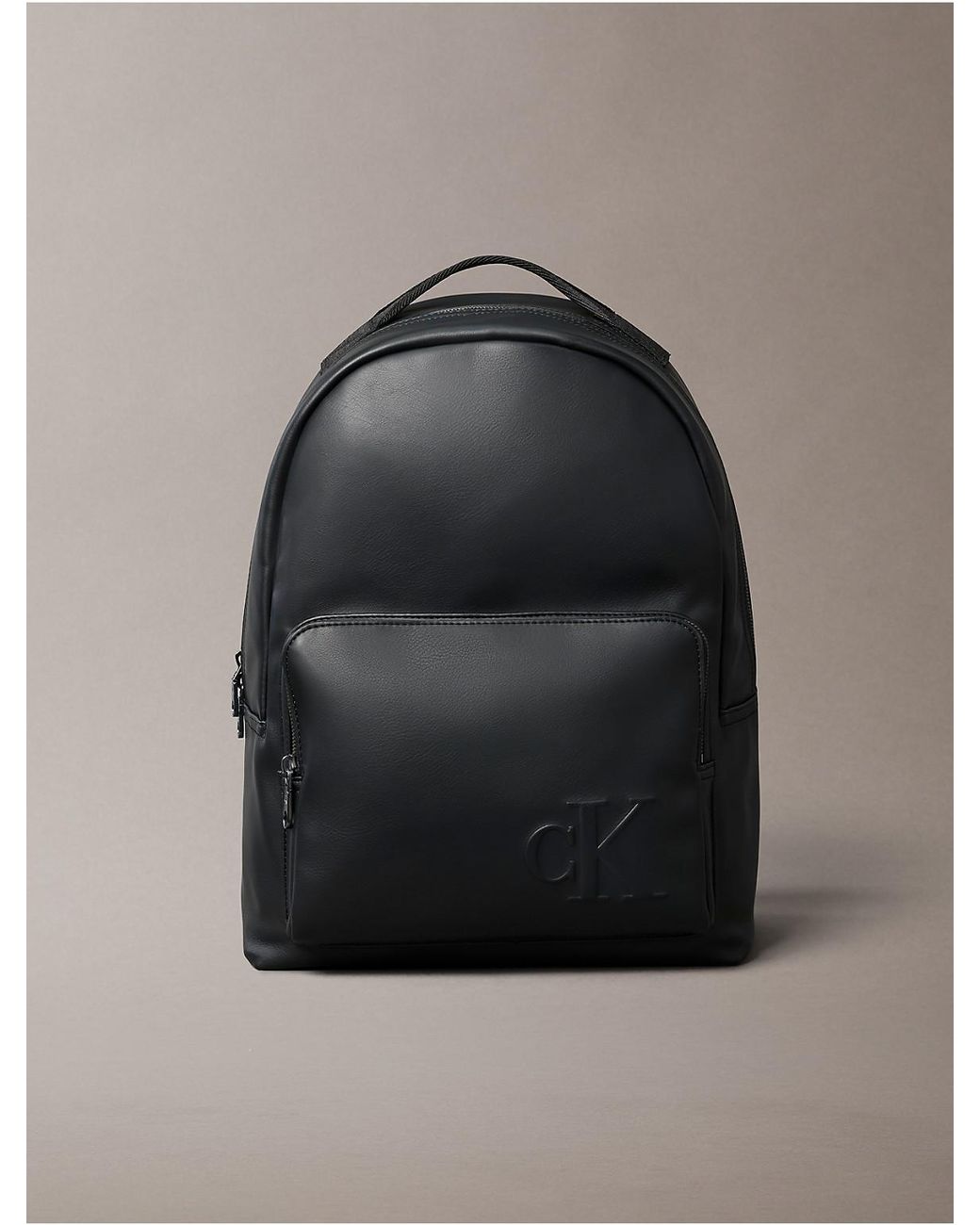Calvin Klein Embossed Monogram Backpack in Gray for Men | Lyst