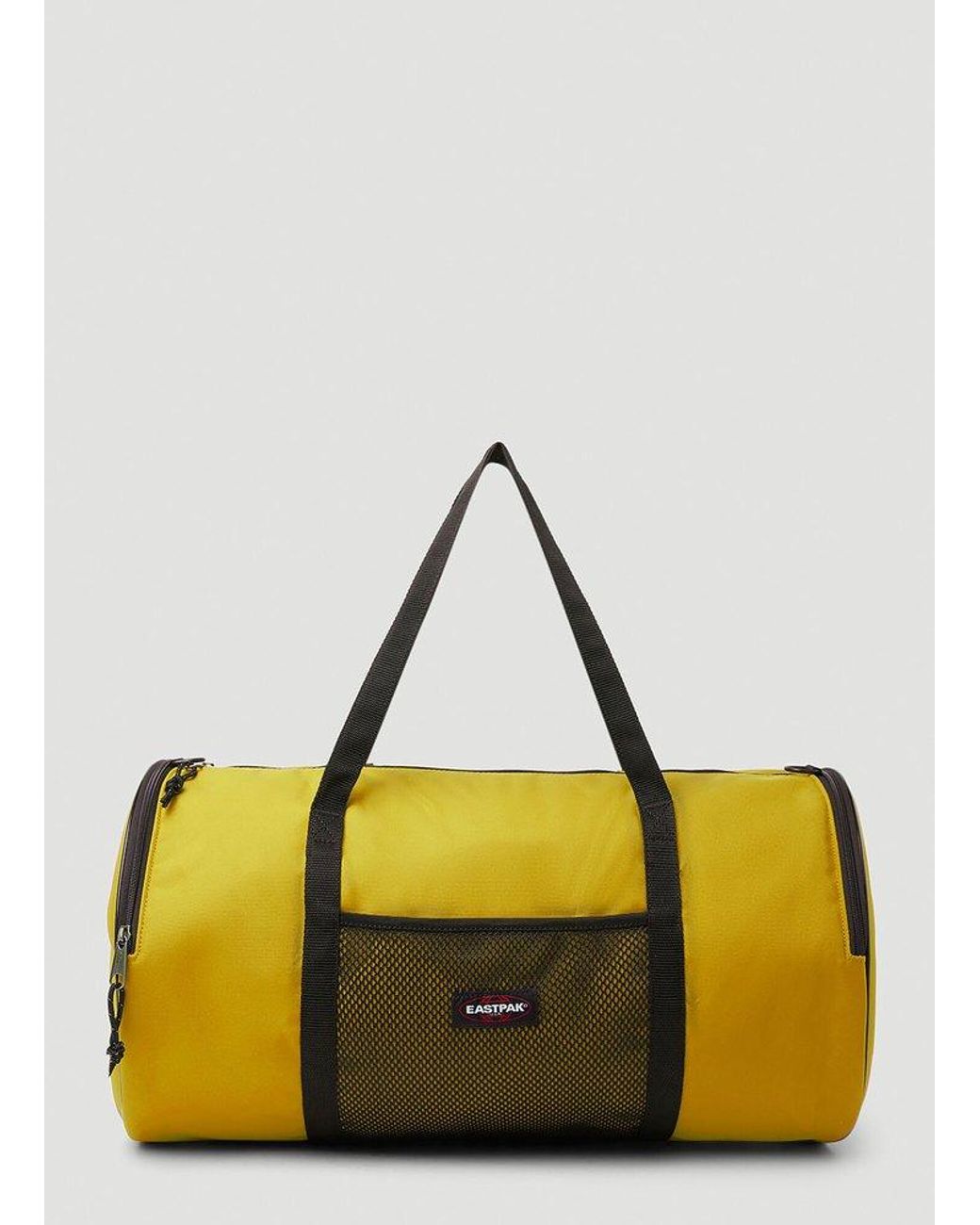 Eastpak Large Duffle Shoulder Bag in Yellow | Lyst