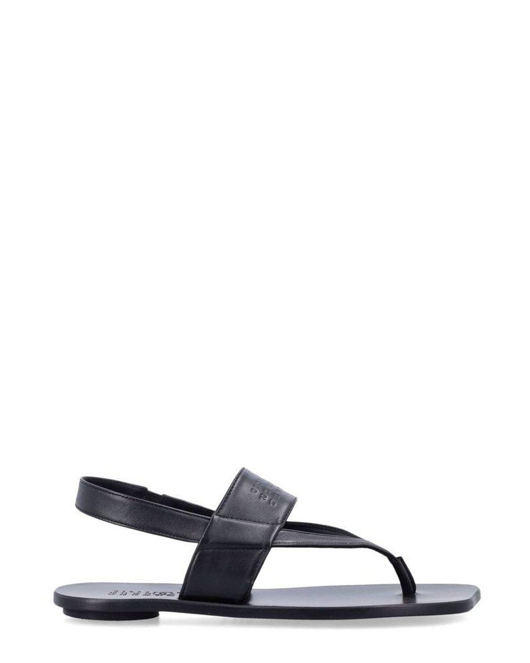 MM6 by Maison Martin Margiela Logo-Embossed Thong Sandals in MM6 by Maison Martin Margiela Logo-Embossed Thong Sandals in