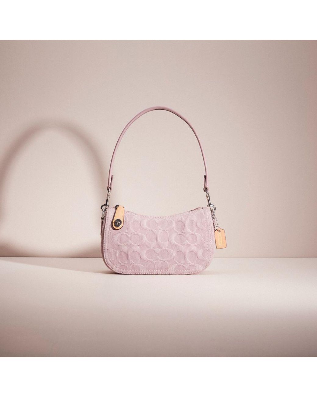 COACH Restored Swinger 20 In Signature Denim in Pink | Lyst