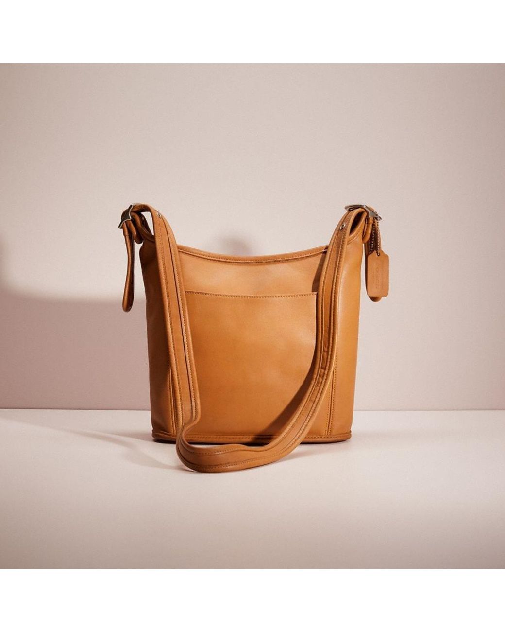 COACH Vintage Medium Slim Duffle Sac in Brown | Lyst