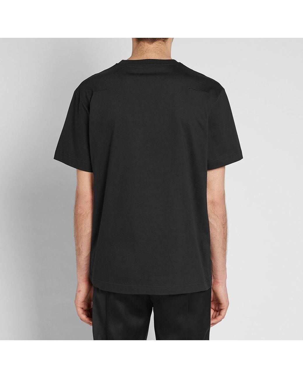 dior-homme-Black-X-Kaws-Dior- dior-homme-Black-X-Kaws-Dior-
