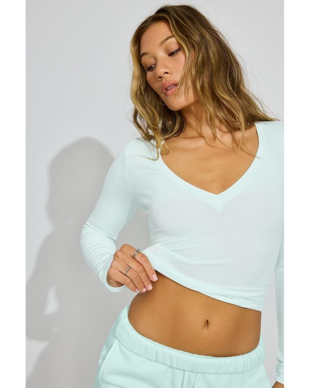 Garage Serene Deep V-Neck Long Sleeve Top in White | Lyst