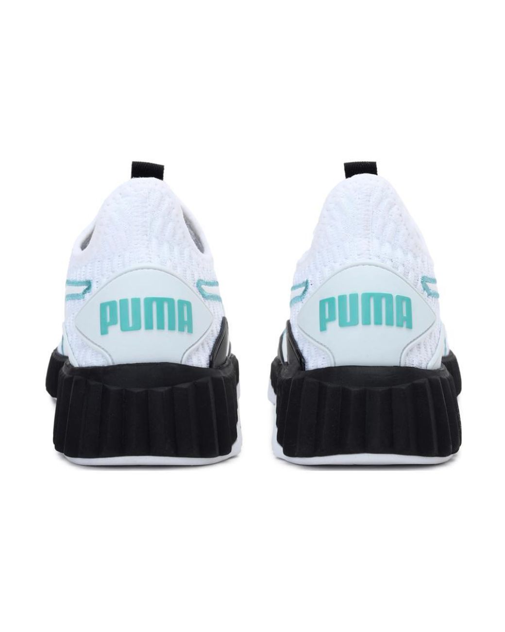 PUMA (Wmns) Defy Trainer in Blue | Lyst