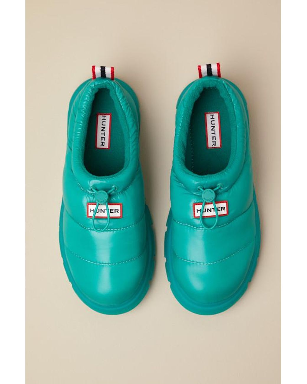 HUNTER Madison Light Waterproof Puffer Slip-Ons in Green | Lyst