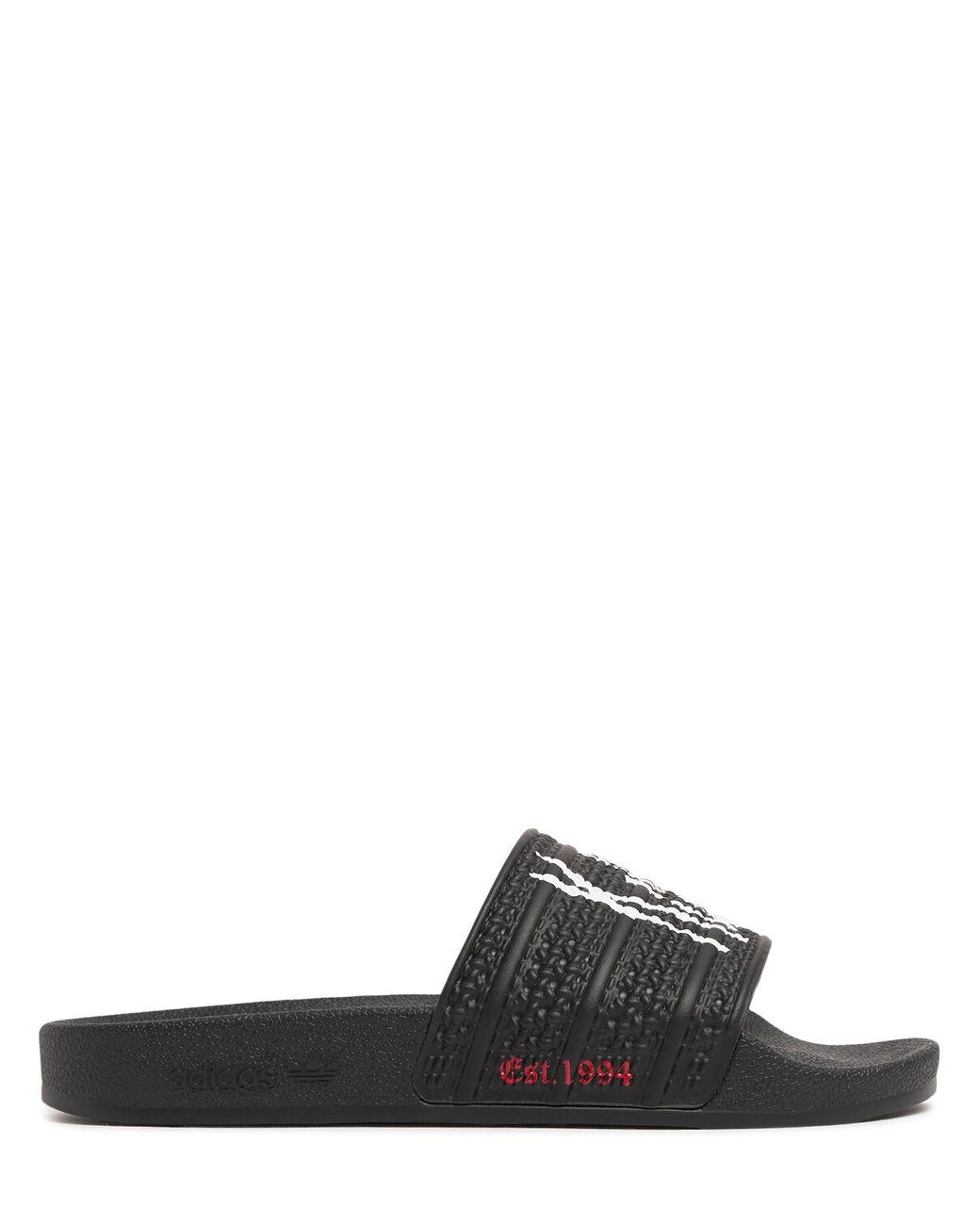 adidas Originals Korn Adilette Slides in Black | Lyst