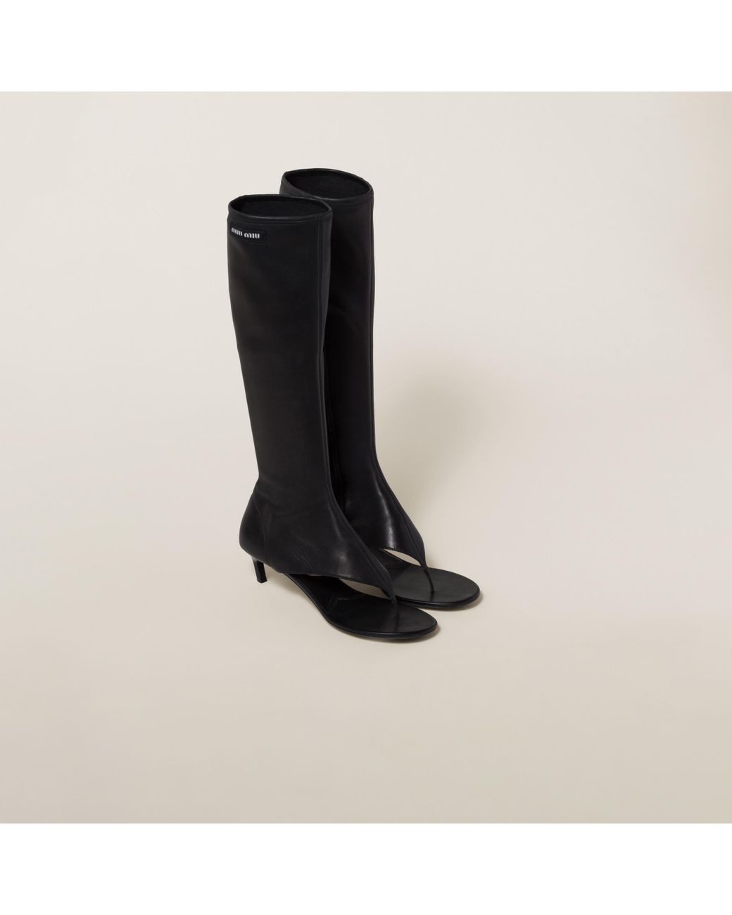 Miu Miu Stretch Nappa Leather Thong Boots in Black | Lyst