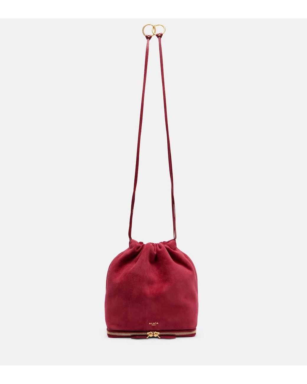 Alaïa Le Pochon Suede Bucket Bag in Red | Lyst