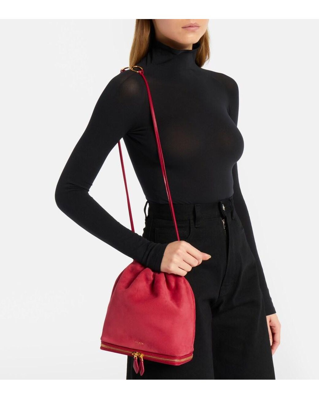 Alaïa Le Pochon Suede Bucket Bag in Red | Lyst