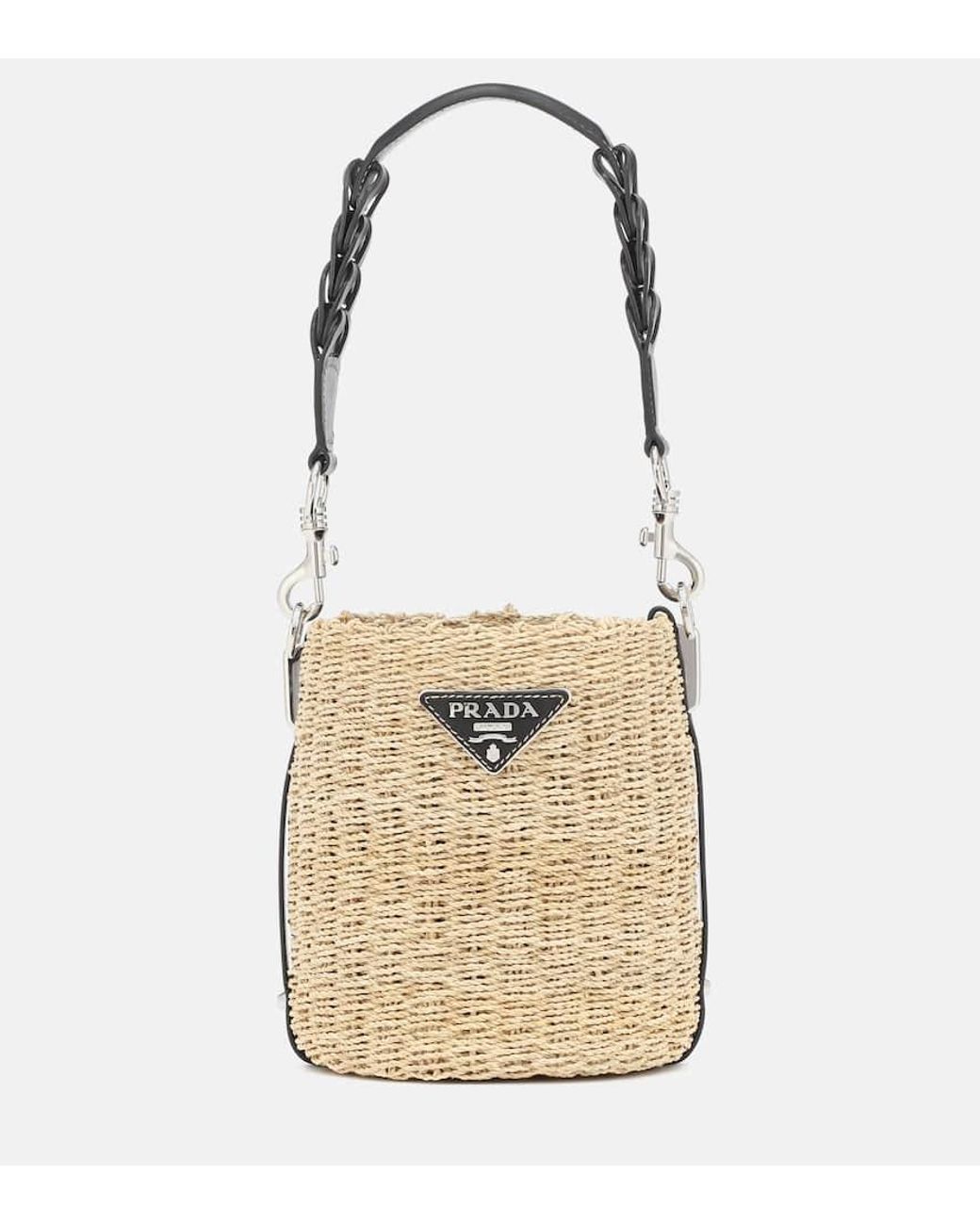 Prada Leather-Trimmed Raffia Bucket Bag in White | Lyst