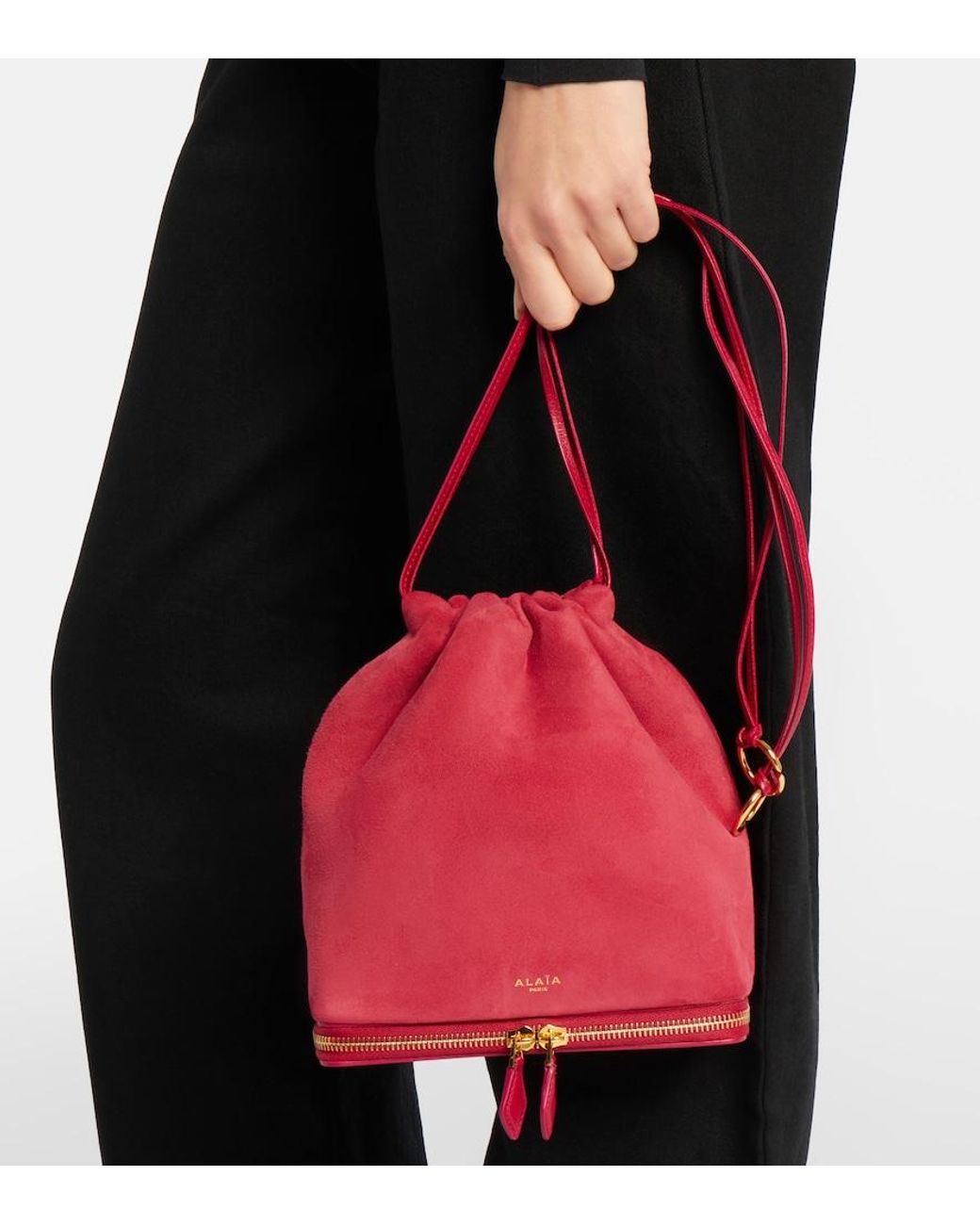 Alaïa Le Pochon Suede Bucket Bag in Red | Lyst