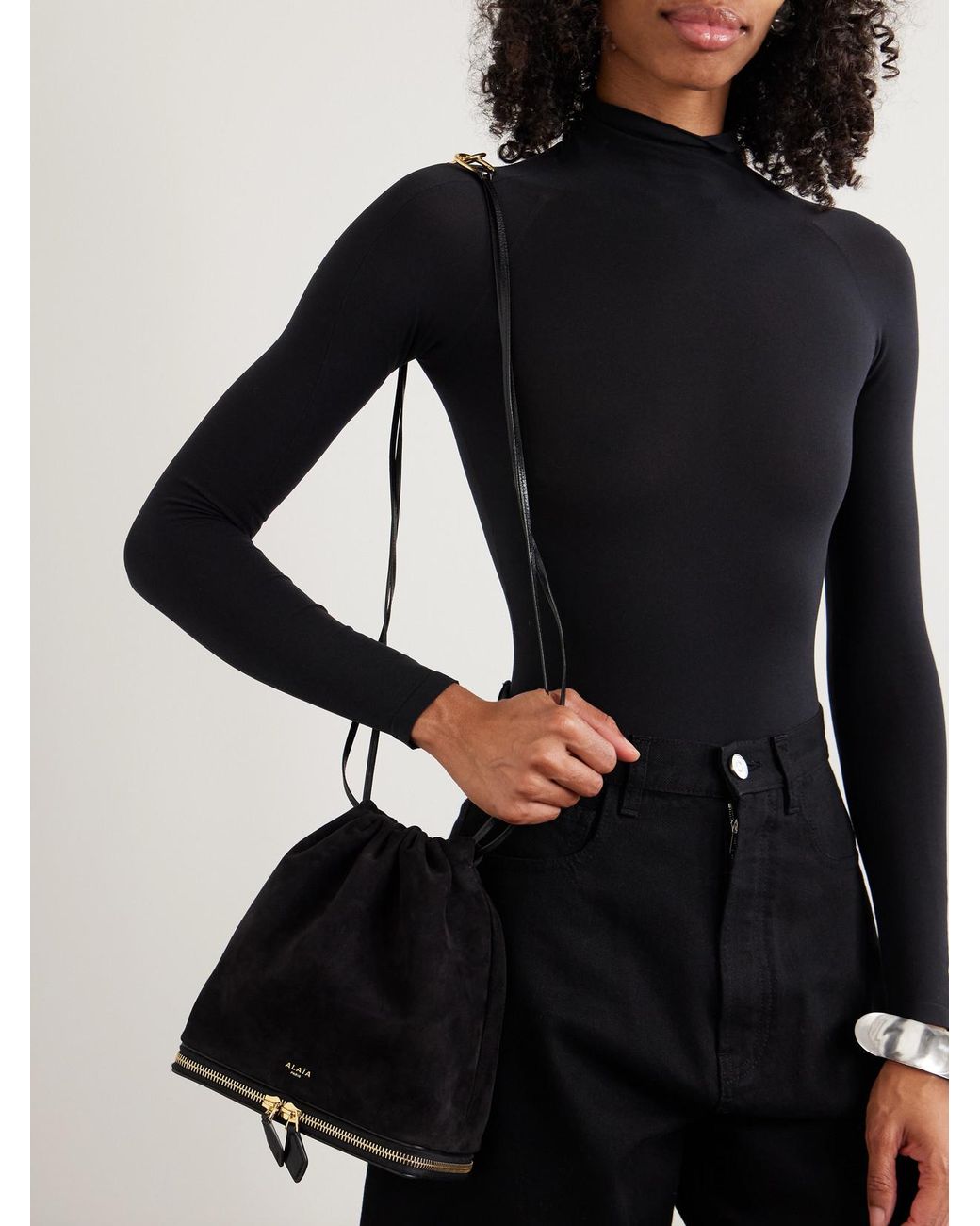 Alaïa Le Pochon Leather-Trimmed Suede Shoulder Bag in Black | Lyst UK