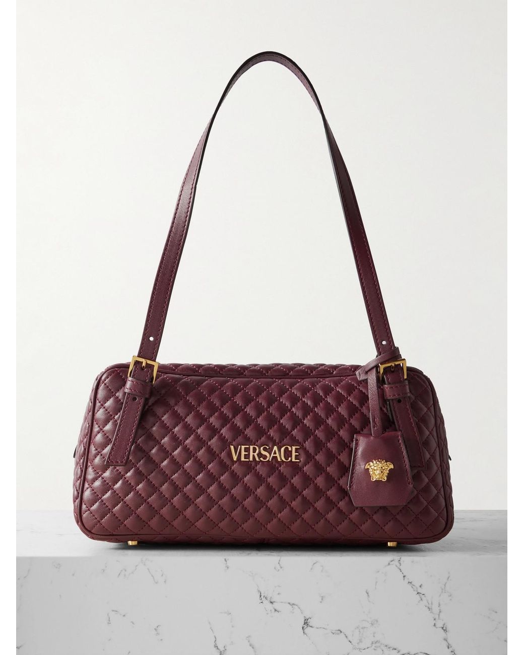 Versace Tag Quilted Leather Shoulder Bag in Purple | Lyst