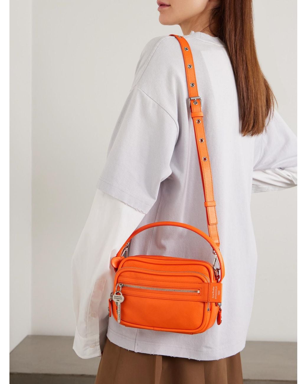 Acne Studios Embellished Textured-Leather Shoulder Bag in Orange | Lyst