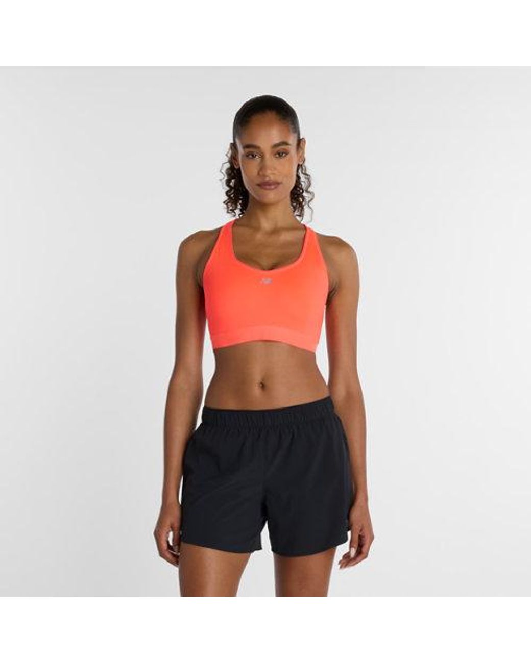 New Balance Nb Essential Run Bra in Red | Lyst