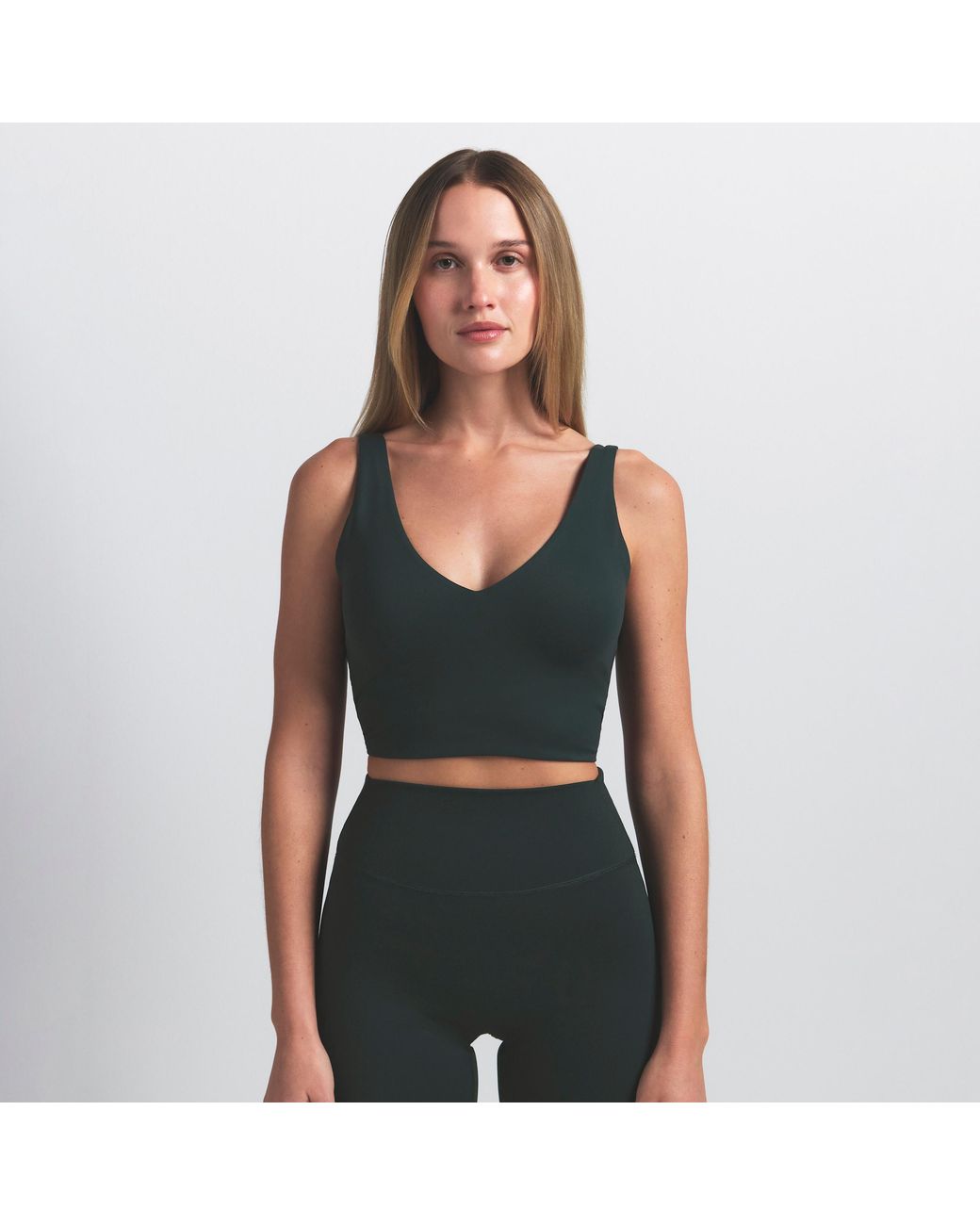 Nike Skims Matte V-Neck Long-Line Bra in Green | Lyst