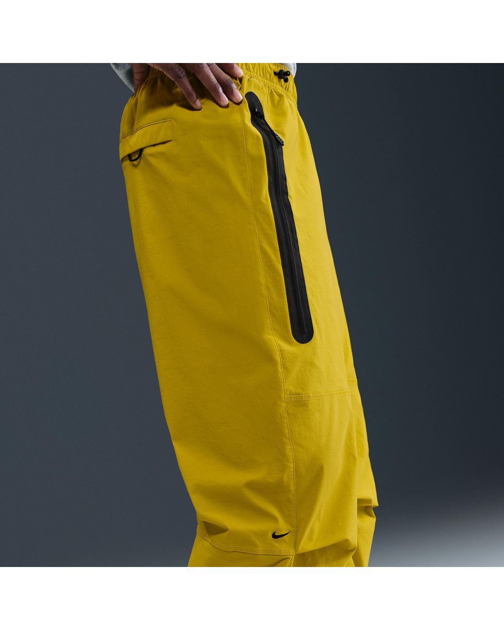 Nike Tech Woven Oversized Pants in Yellow for Men | Lyst