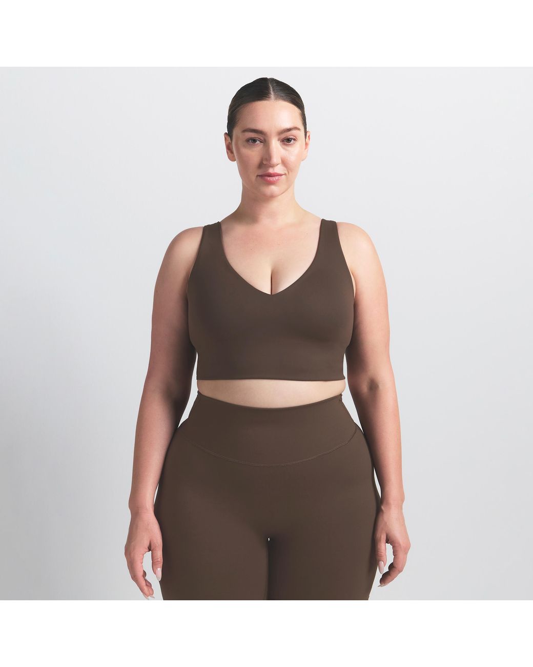 Nike Skims Matte V-Neck Long-Line Bra in Brown | Lyst