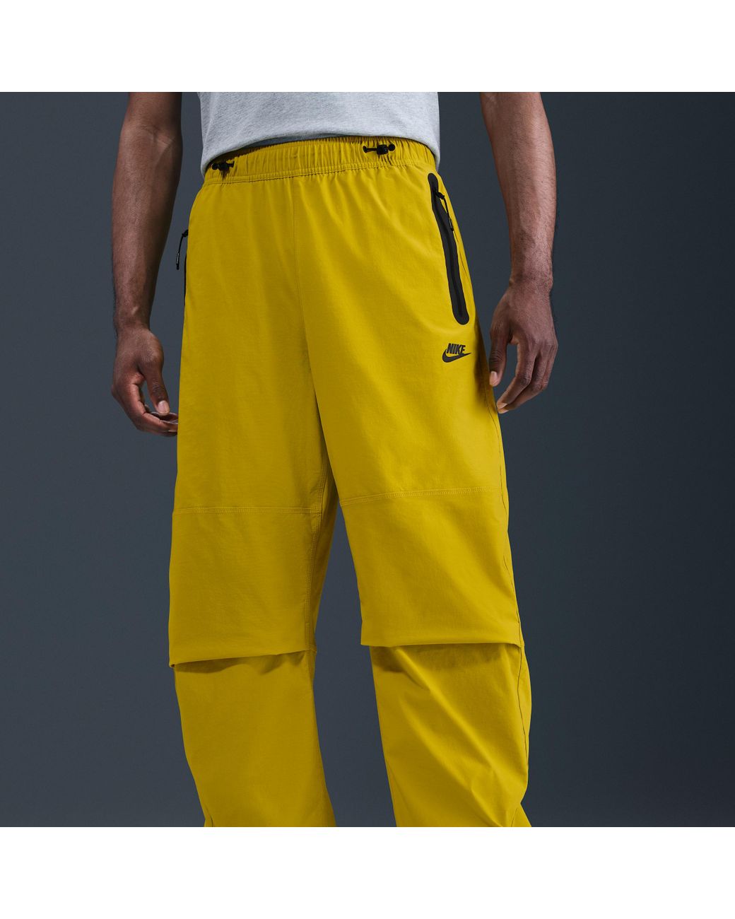 Nike Tech Woven Oversized Pants in Yellow for Men | Lyst