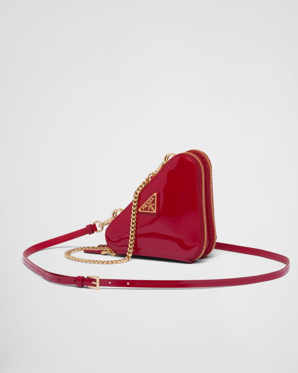 Prada Triangular Patent Leather Mini Pouch in Red | Lyst