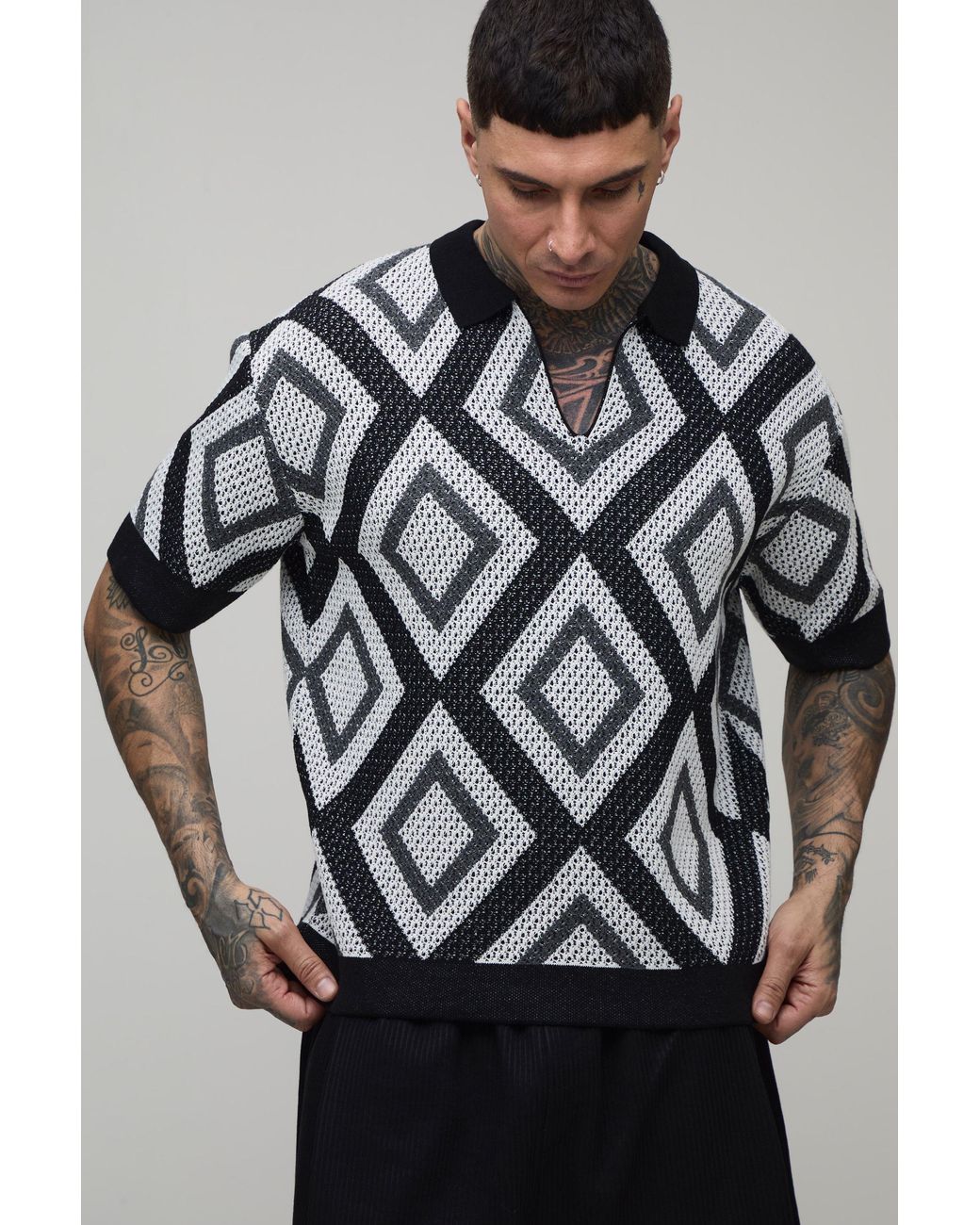 BoohooMAN Tall Relaxed Crochet Tapestry Knitted Polo in Black for Men ...