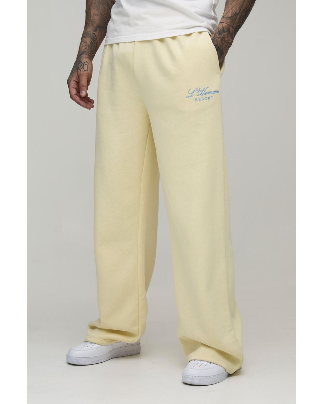 BoohooMAN Tall Wide Leg Embroidered Homme Joggers in Natural for Men ...