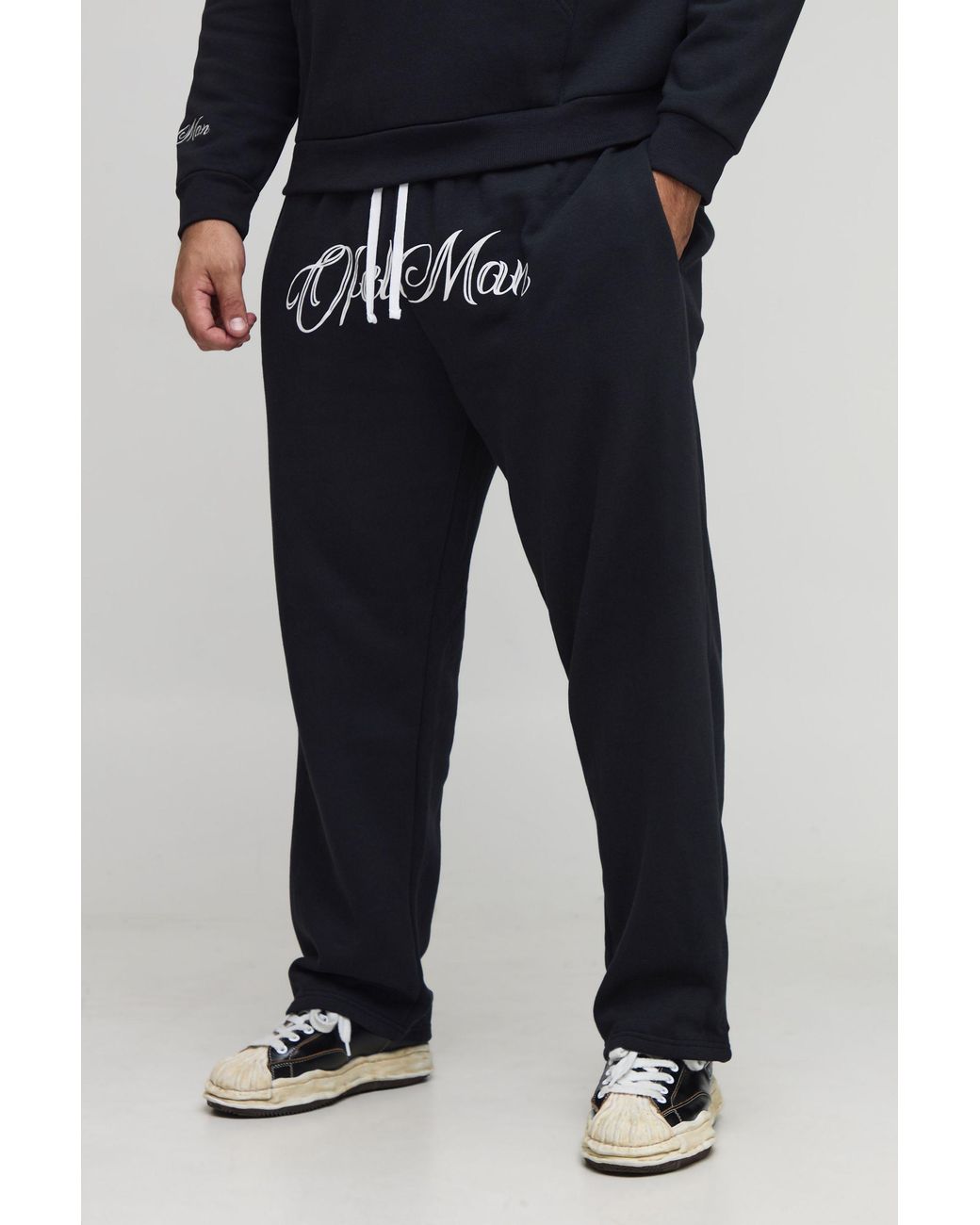 BoohooMAN Plus Baggy Fit Ofcl Print Extended Drawcord Joggers in Black ...