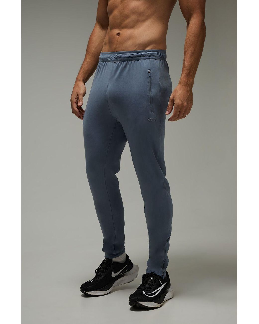 BoohooMAN Active Gym Essentials Stretch Tapered Jogger in Blue for Men ...