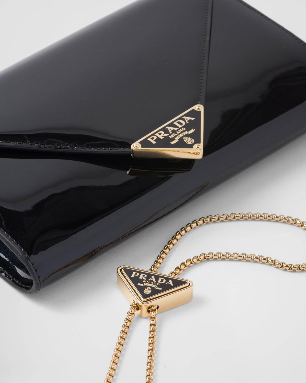 Prada Chain-Linked Clutch Bag in Black | Lyst
