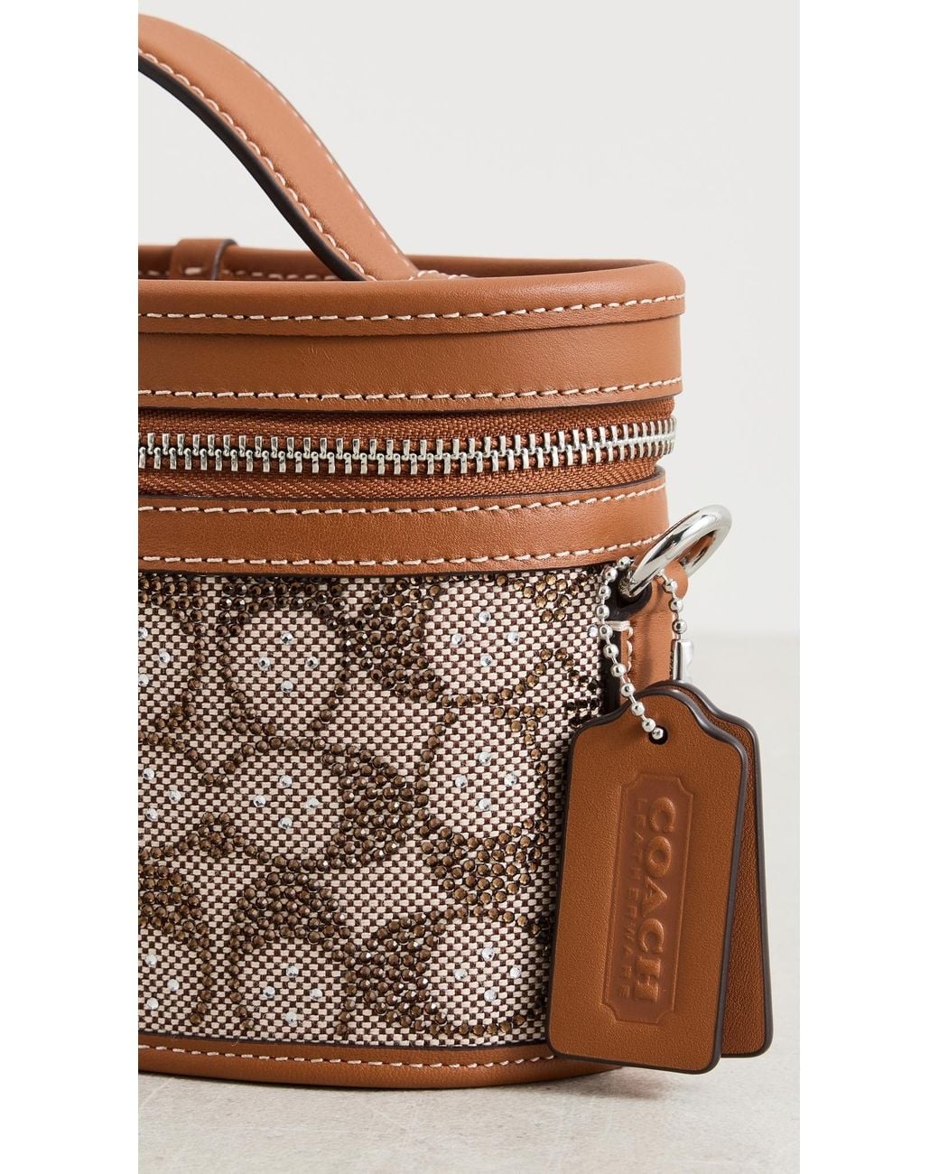 COACH Crystal Signature Jacquard Trail Bag in Brown | Lyst