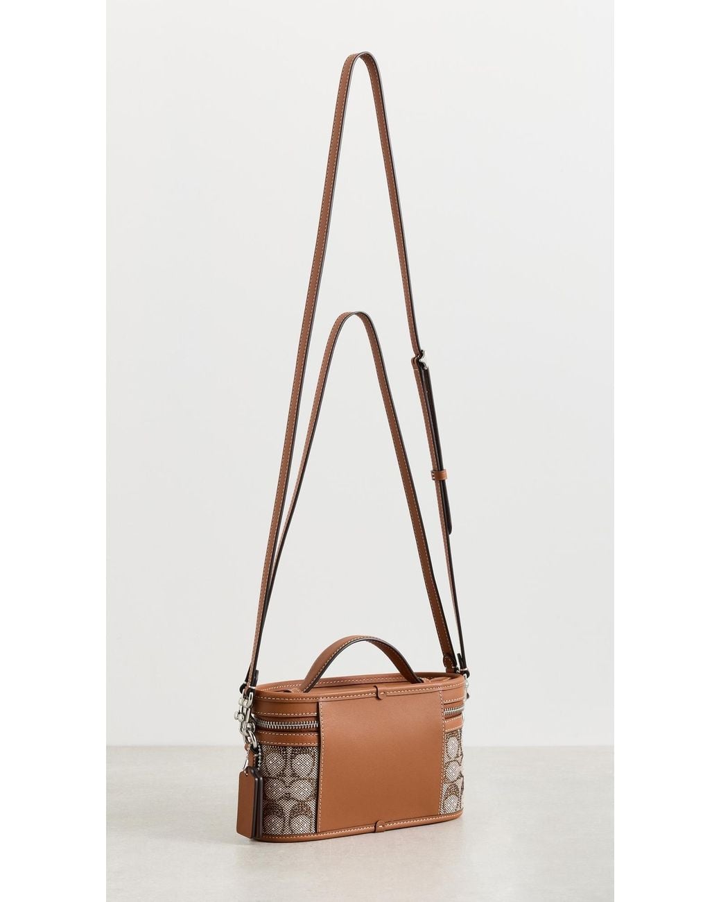 COACH Crystal Signature Jacquard Trail Bag in Brown | Lyst