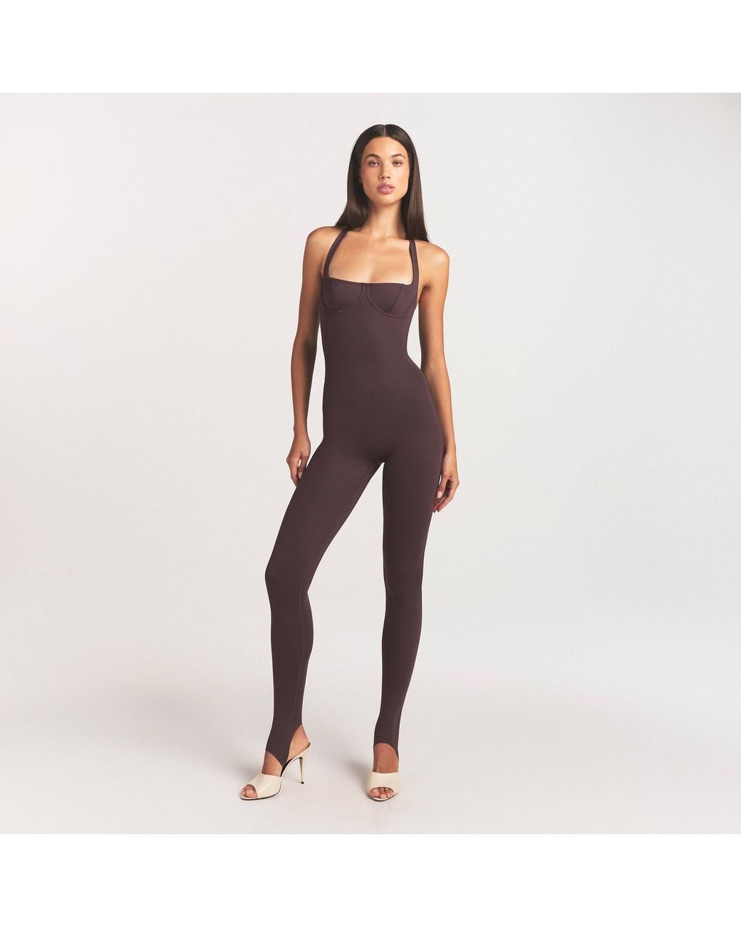 Skims Halter Stirrup Catsuit in Purple | Lyst