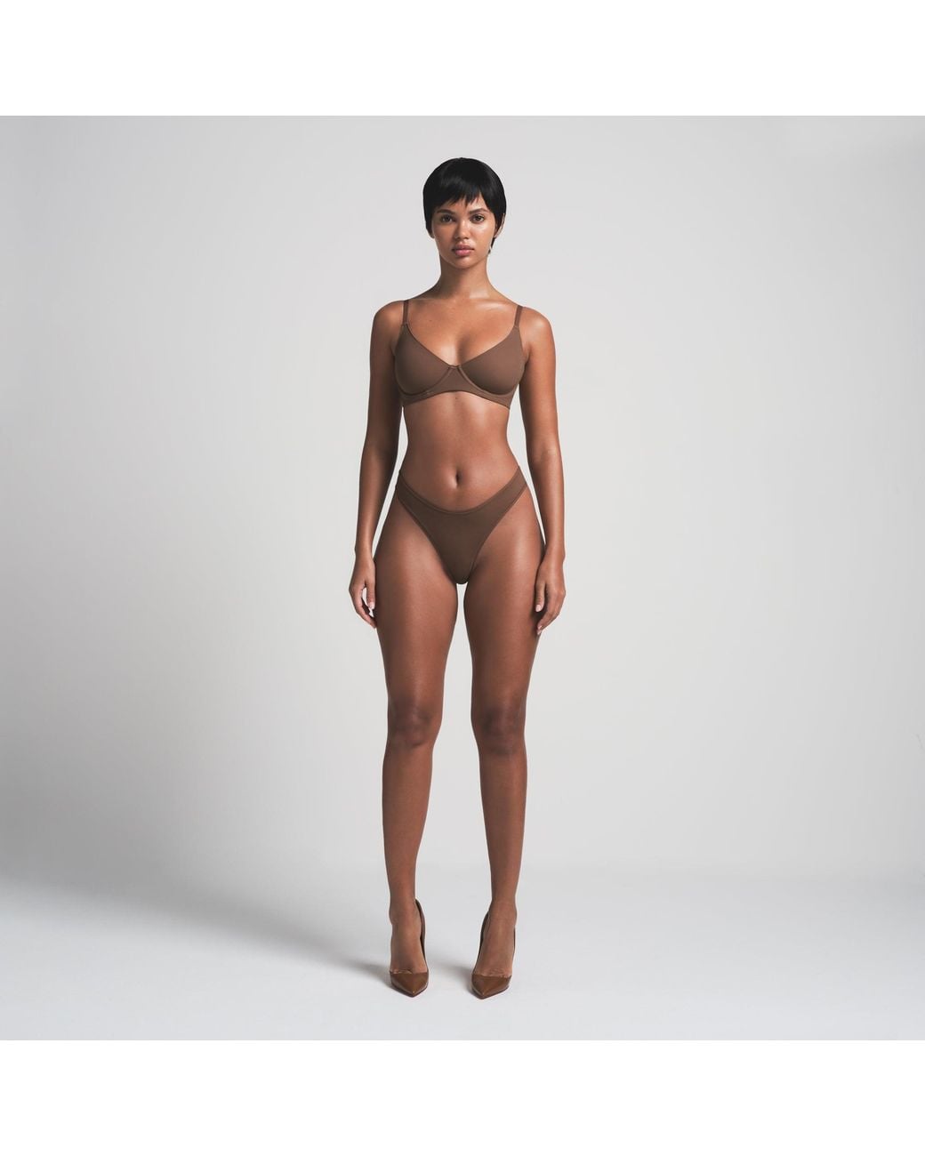 Skims Unlined Demi Bra in Brown | Lyst