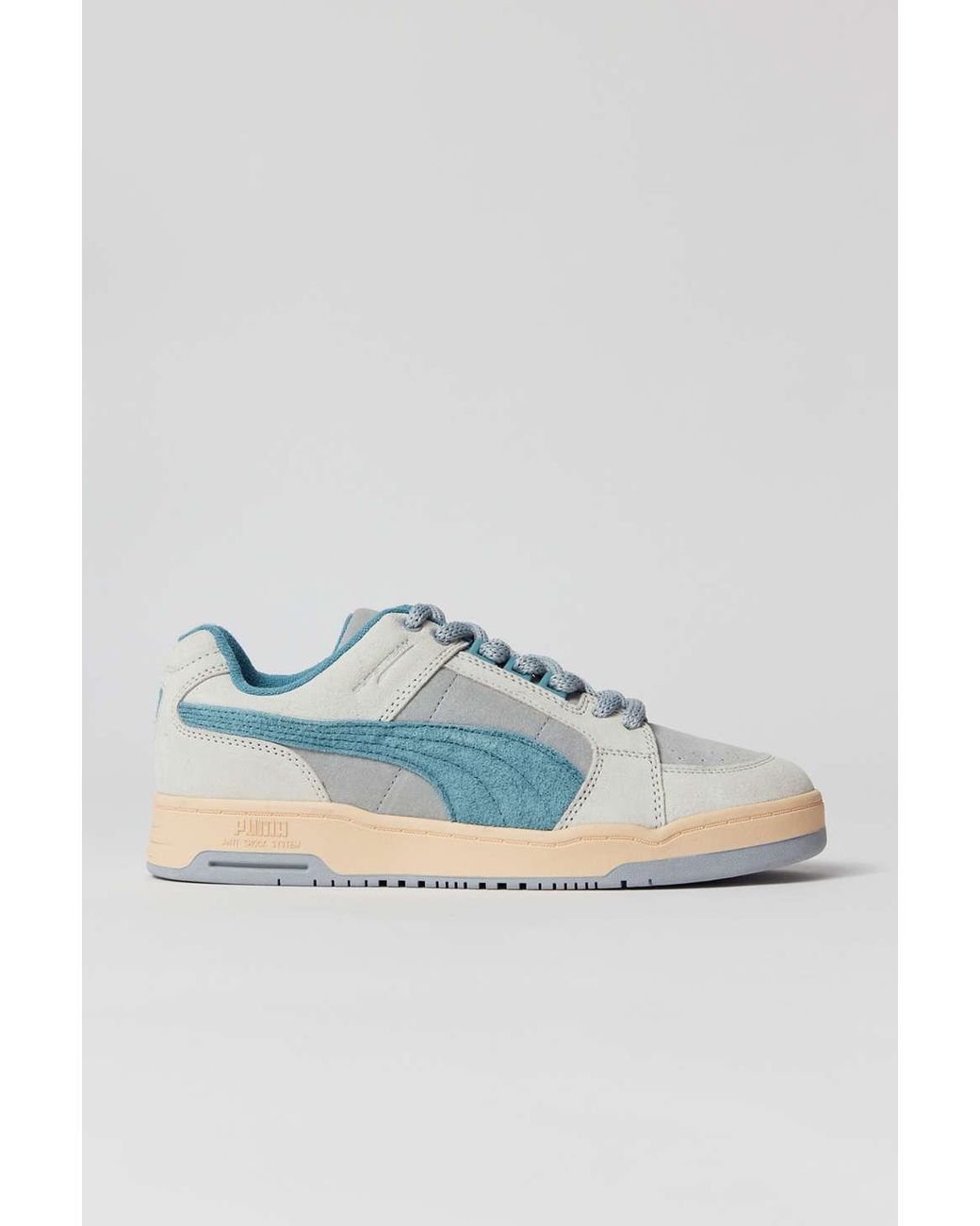 PUMA Slipstream Low Textured Sneaker In Sky,at Urban Outfitters in Blue ...
