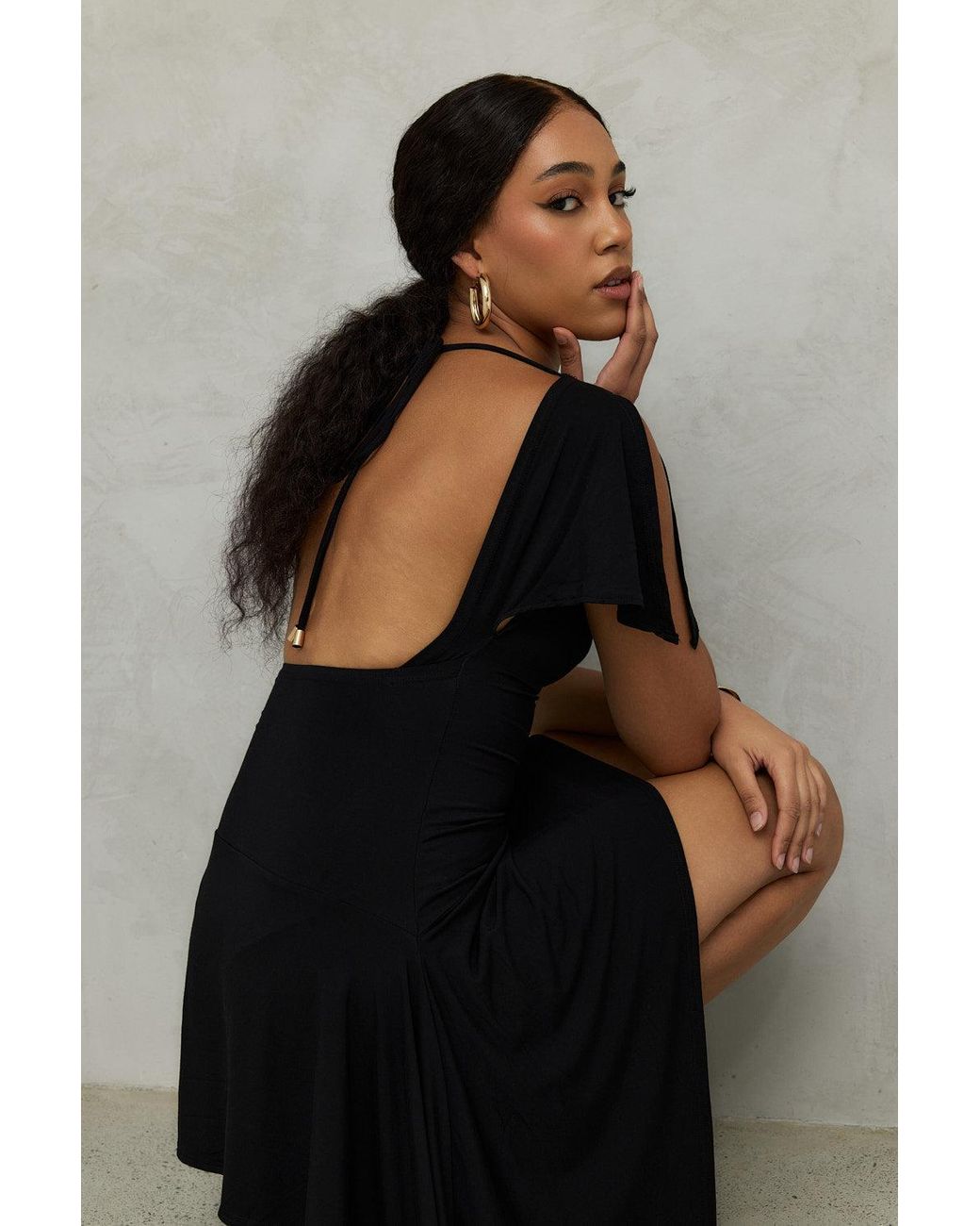 Why Mary Athena Asymmetrical Backless Mini Dress in Black | Lyst