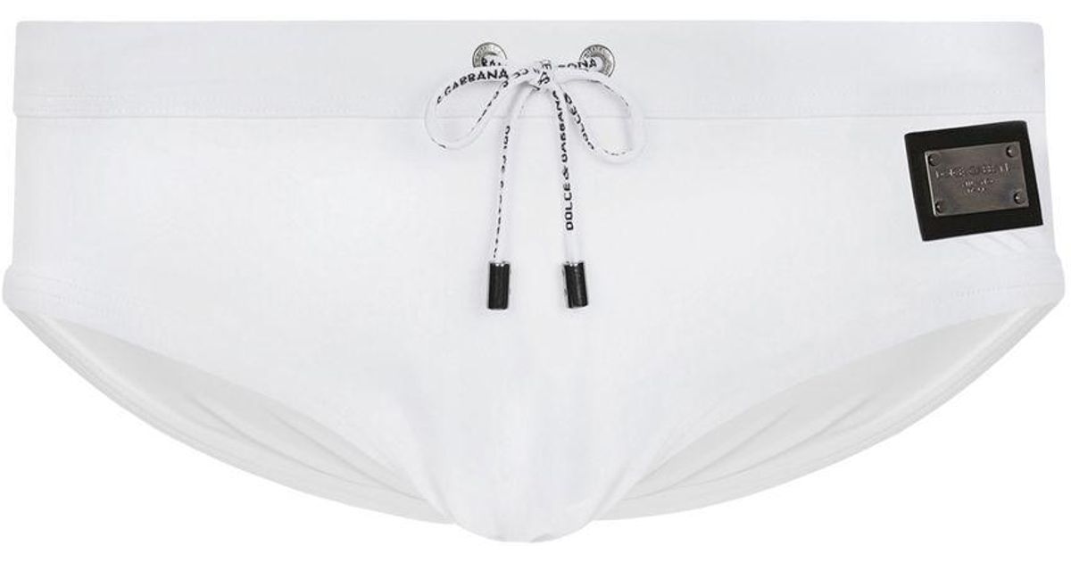 Dolce & Gabbana Swim Briefs With High-Cut Leg And Branded Plate in ...