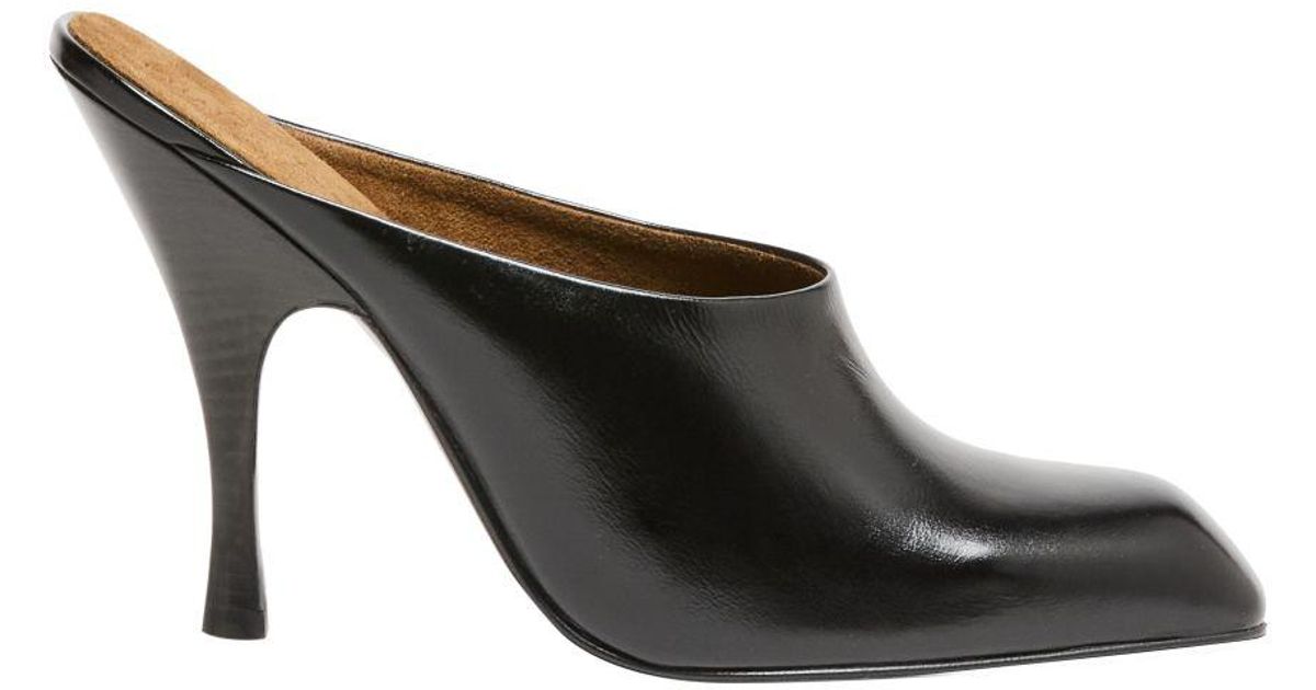 KHAITE Colt Mules in Black | Lyst