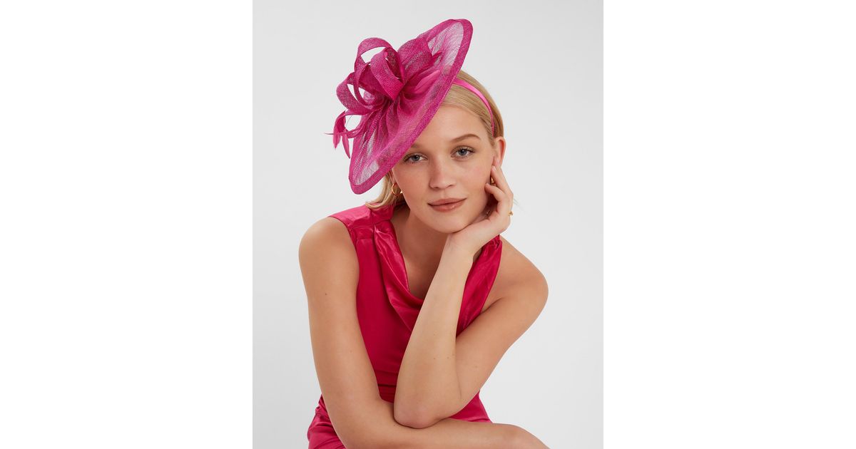 Accessorize Woven Bow Feather Disc Fascinator in Pink | Lyst UK