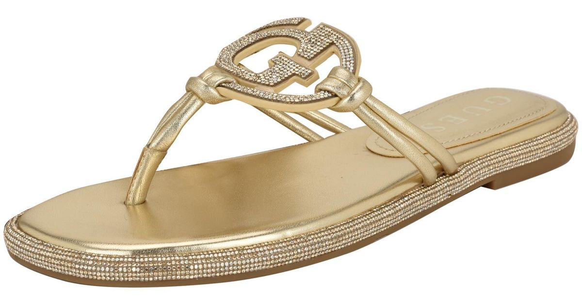 Guess Saima Flat Sandal in Metallic | Lyst