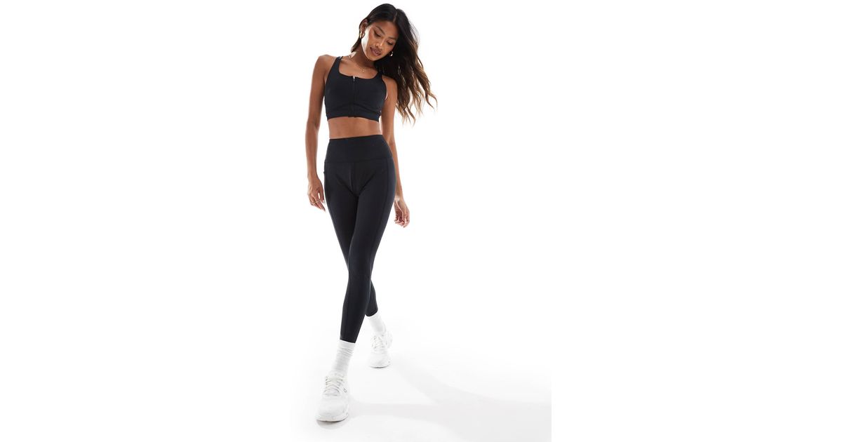 ASOS Icon Running Tie Waist Gym Legging With Phone Pocket in Black | Lyst