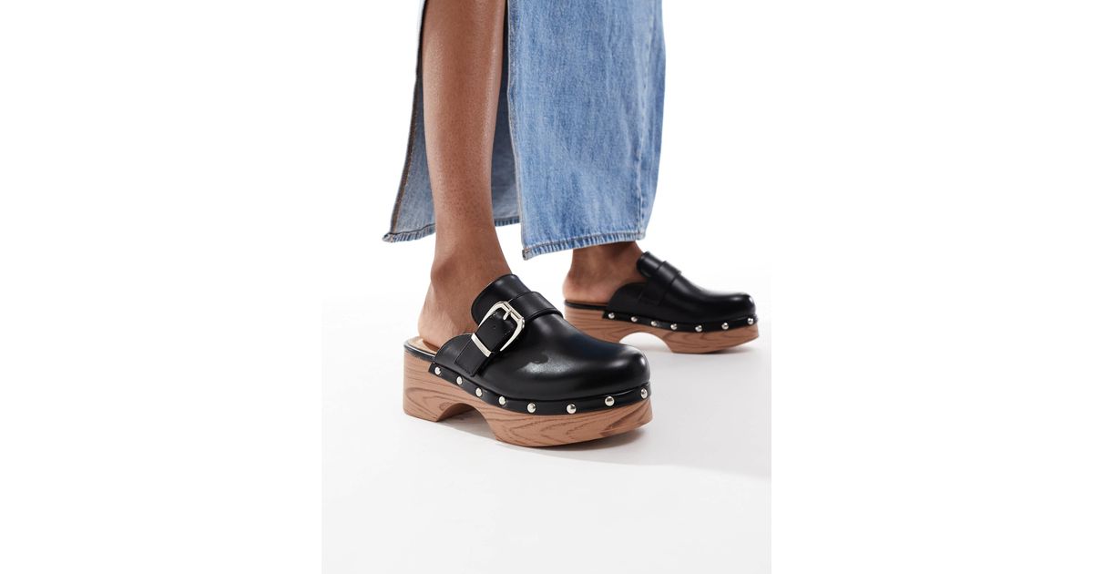 SEQWL Clog Mules With Buckle in Blue | Lyst