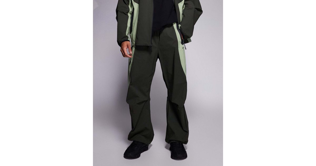 Nike Tech Dri-fit Woven Oversized joggers in Black for Men | Lyst